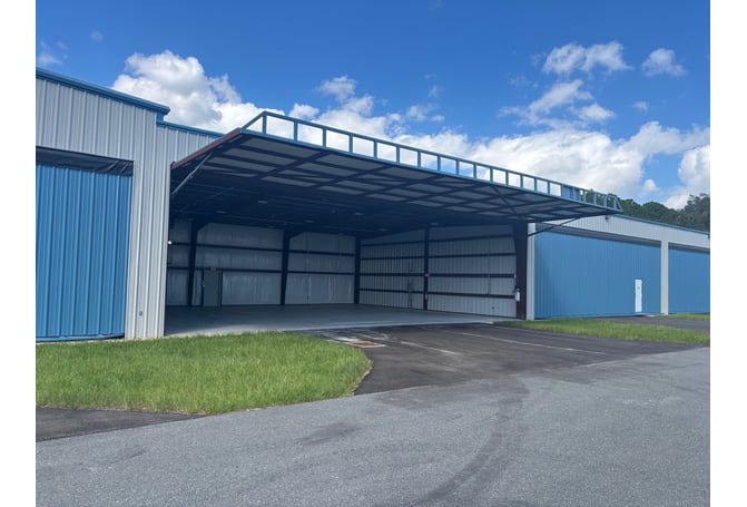Bent Wing II | Aircraft Hangars | Sprinkle